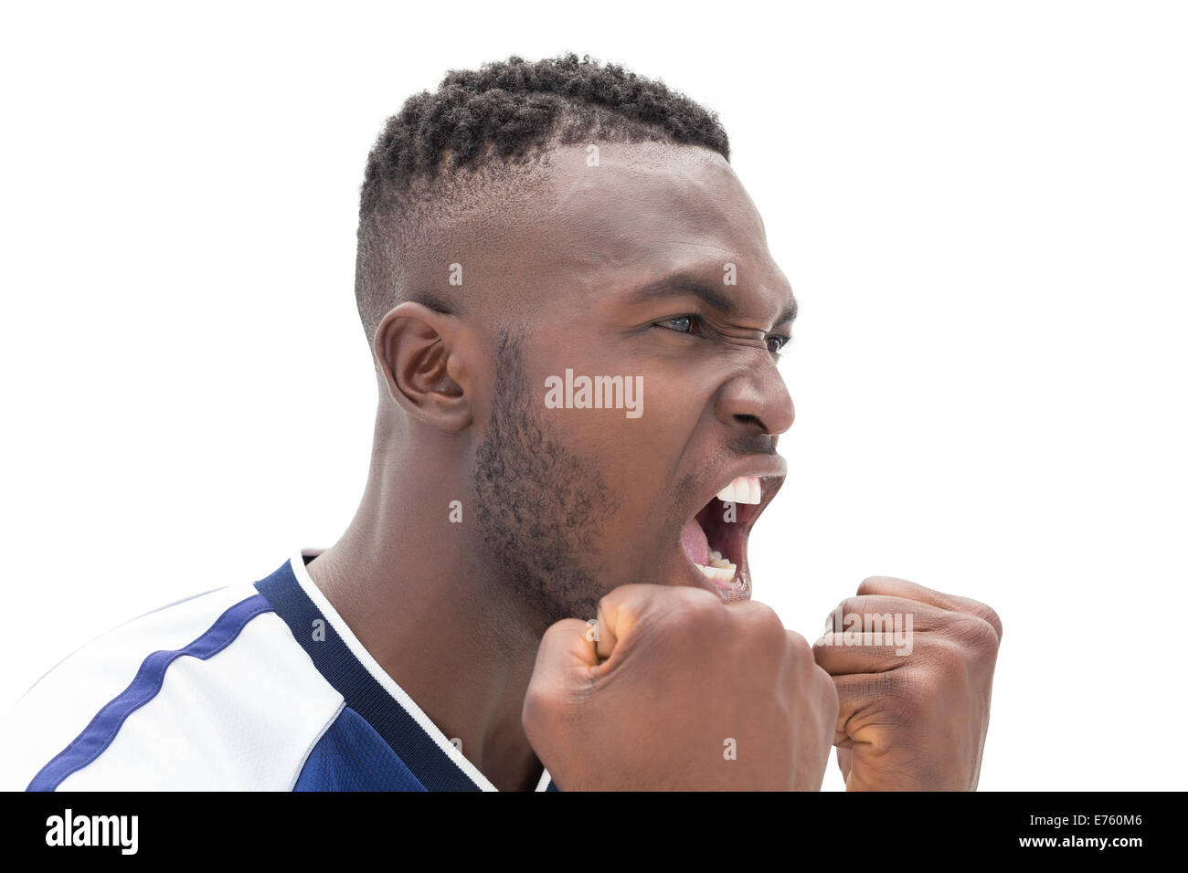 Close up of a football player shouting Stock Photo - Alamy
