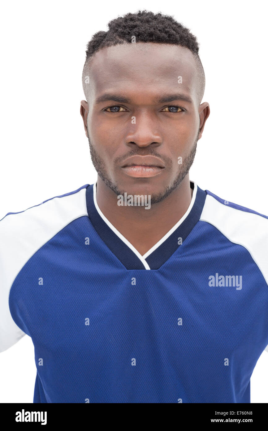 Portrait of a serious football player Stock Photo - Alamy