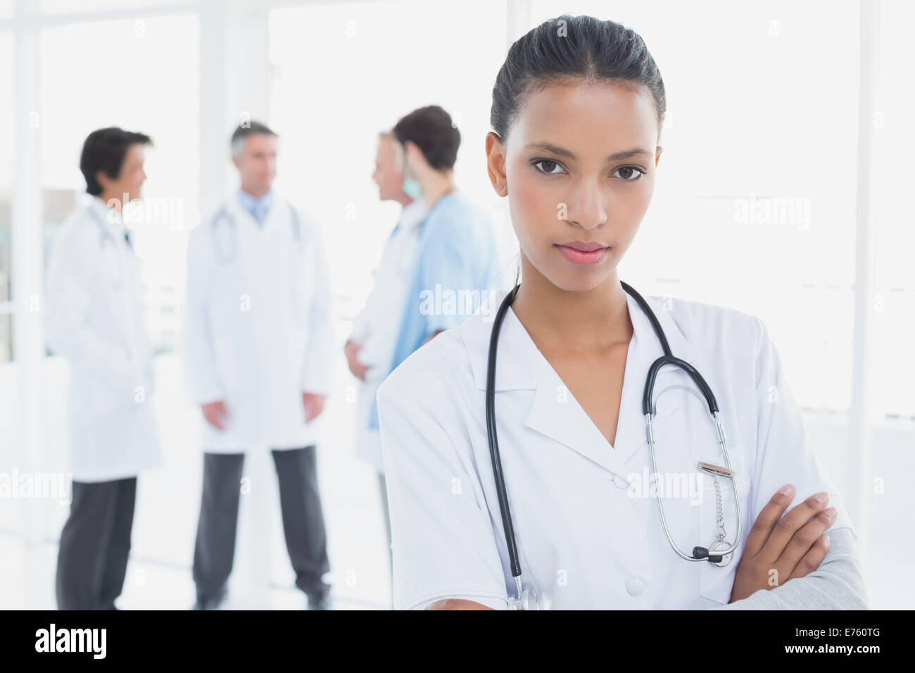 Serious doctor looking at camera Stock Photo - Alamy