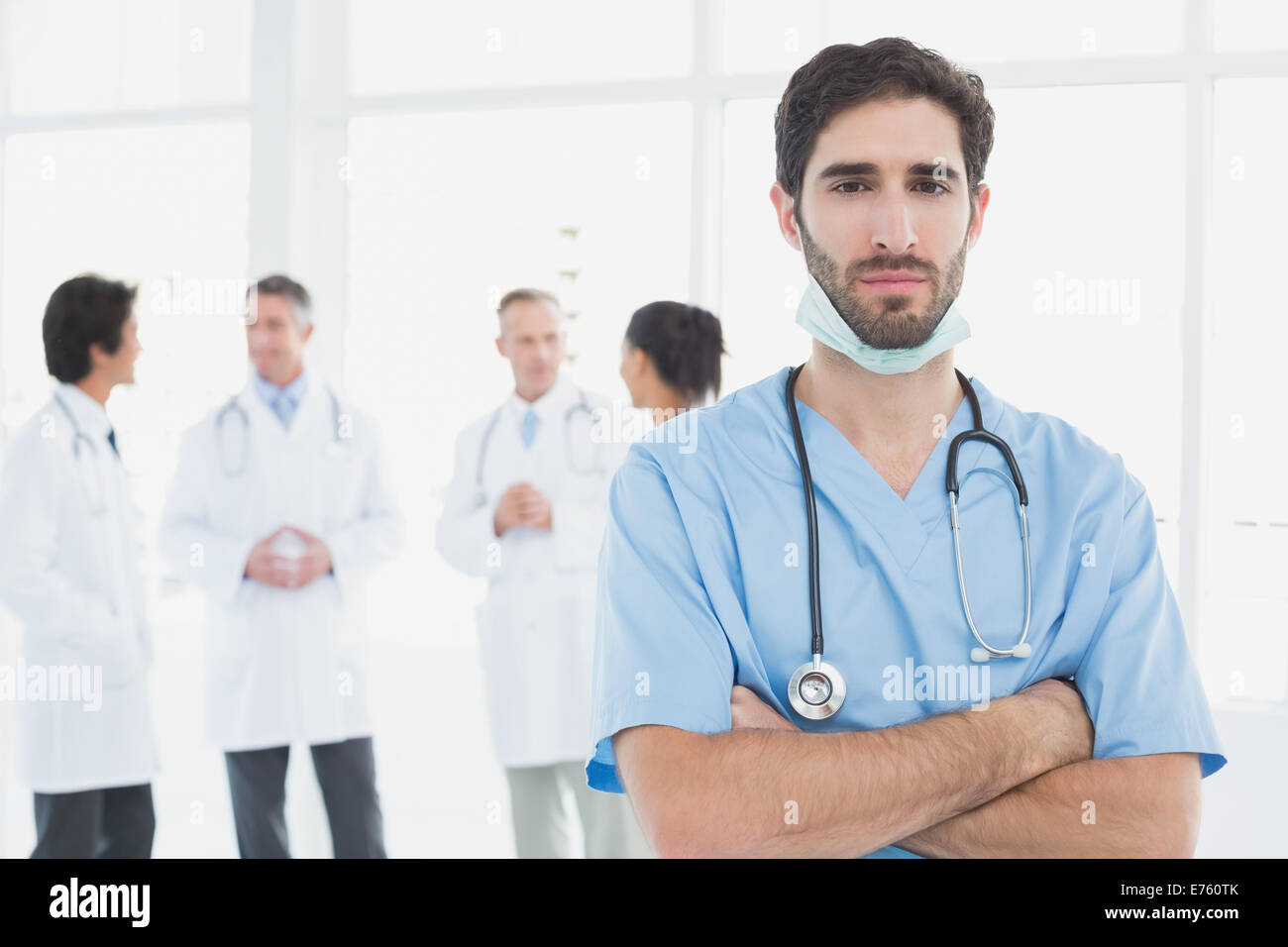 Serious doctor looking at camera Stock Photo - Alamy