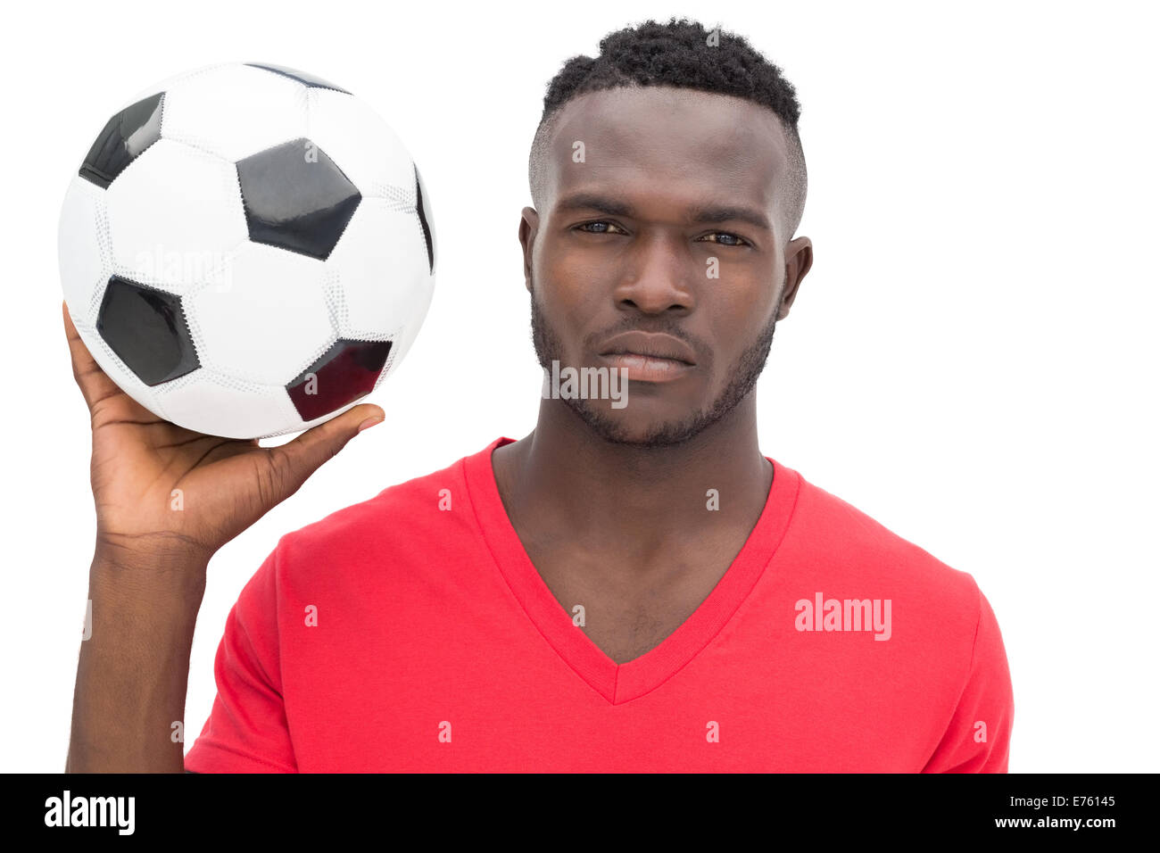 Portrait of a serious handsome football fan Stock Photo - Alamy