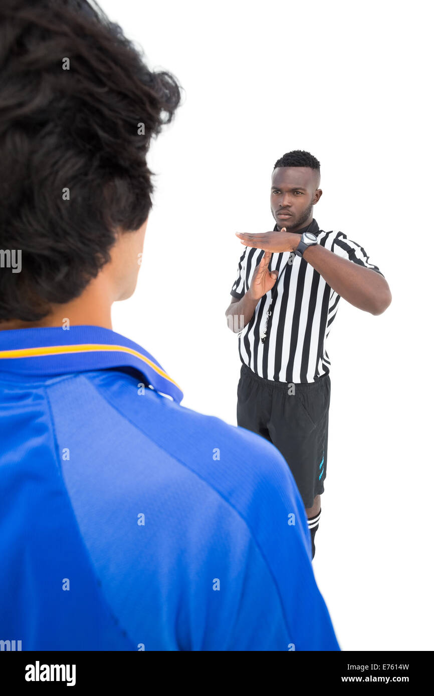 Serious referee showing time out sign to player Stock Photo - Alamy