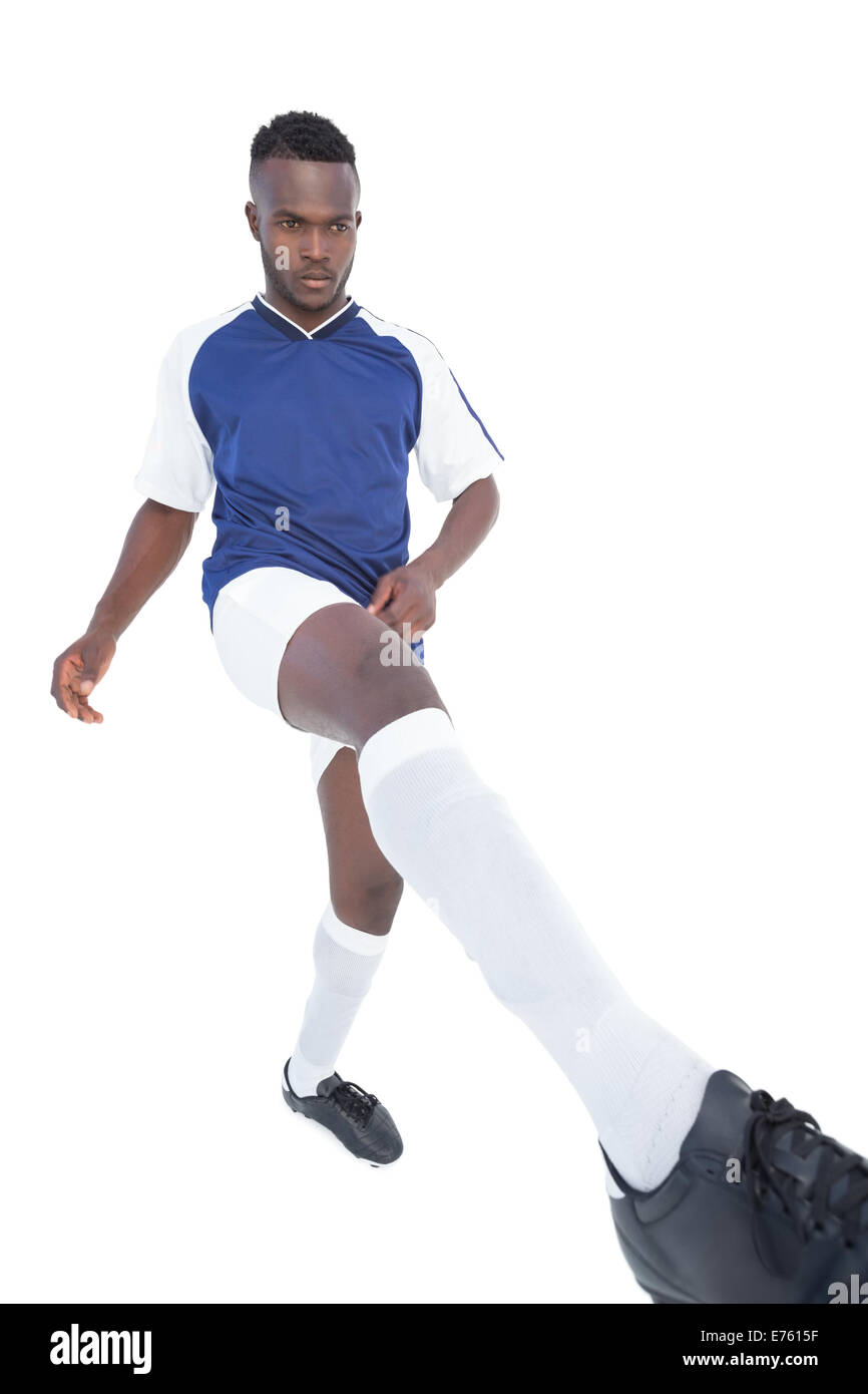 Full length of football player playing Stock Photo - Alamy