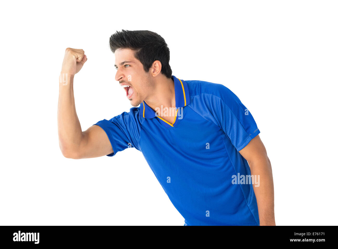 Athletic football player cheering Stock Photo - Alamy