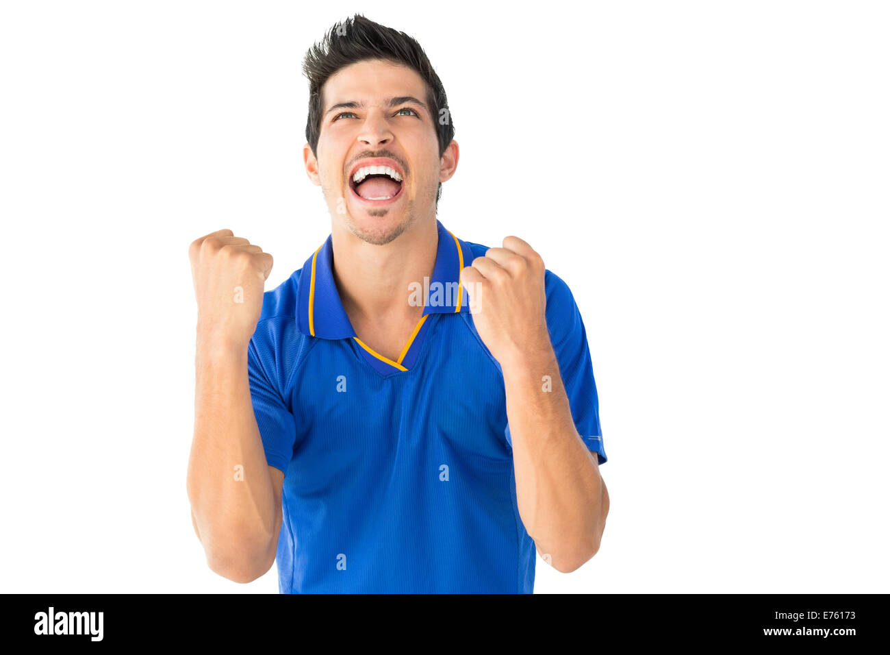 Athletic football player cheering Stock Photo - Alamy