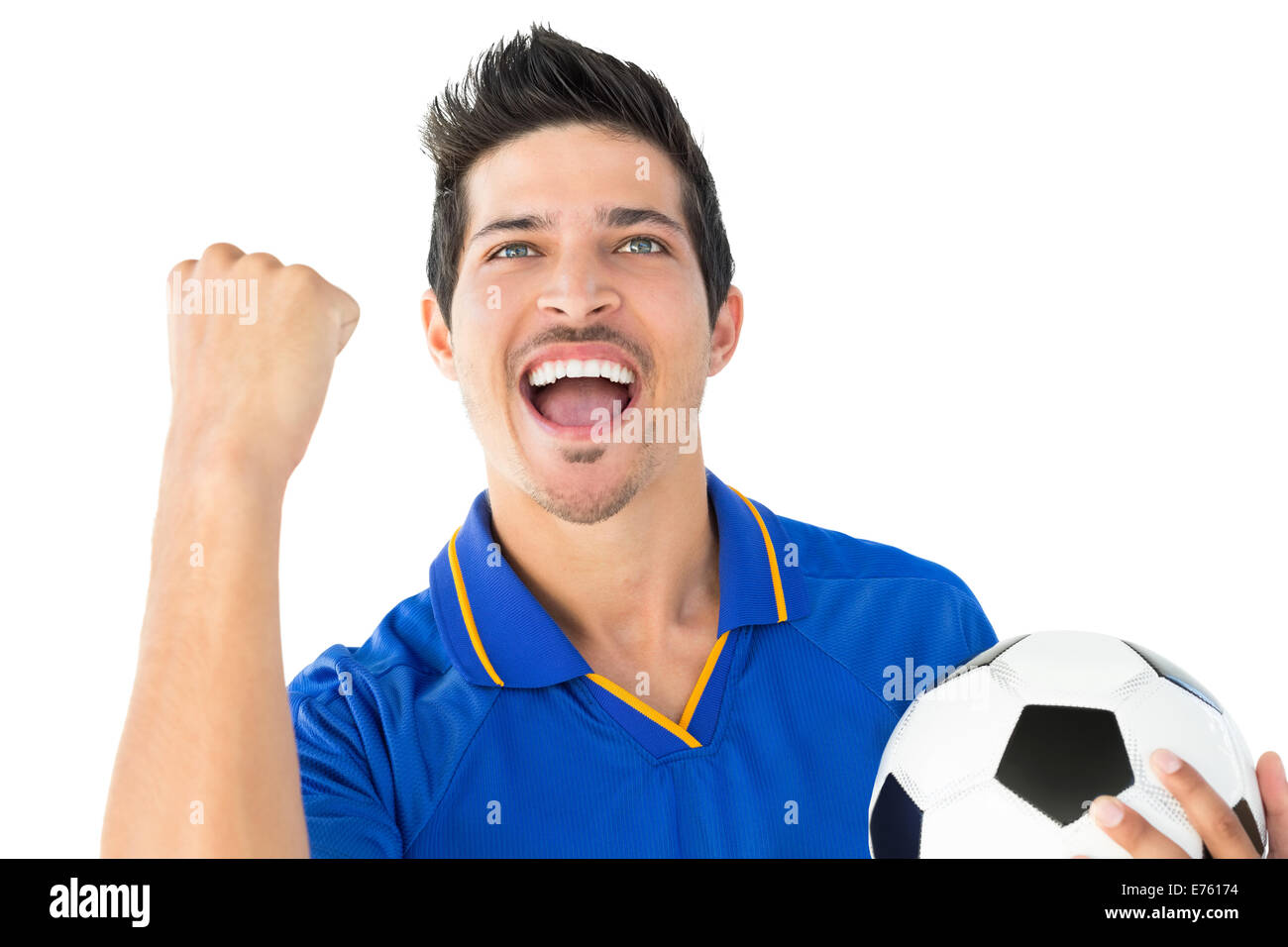 Athletic football player cheering Stock Photo - Alamy