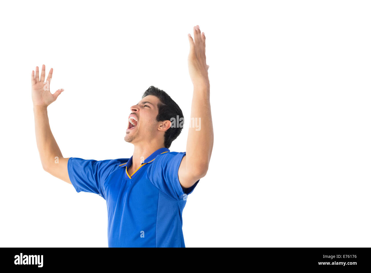 Athletic football player cheering Stock Photo - Alamy