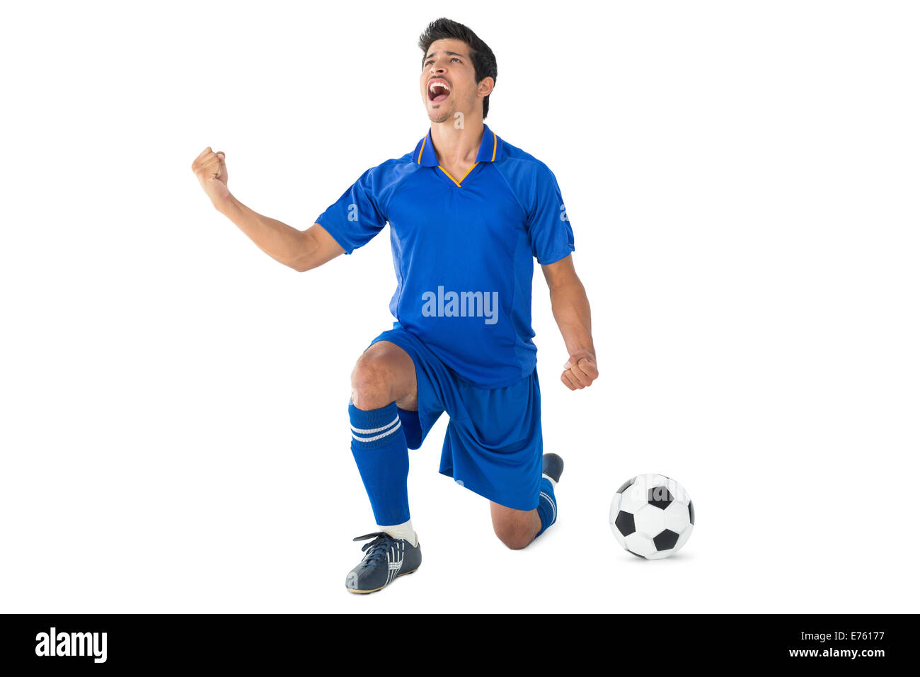 Athletic football player cheering Stock Photo - Alamy