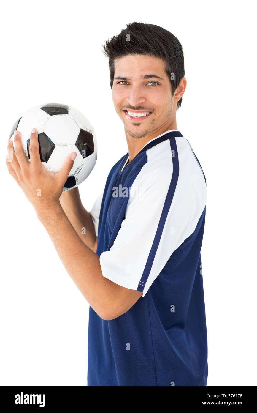 Smiling football player Stock Photo - Alamy