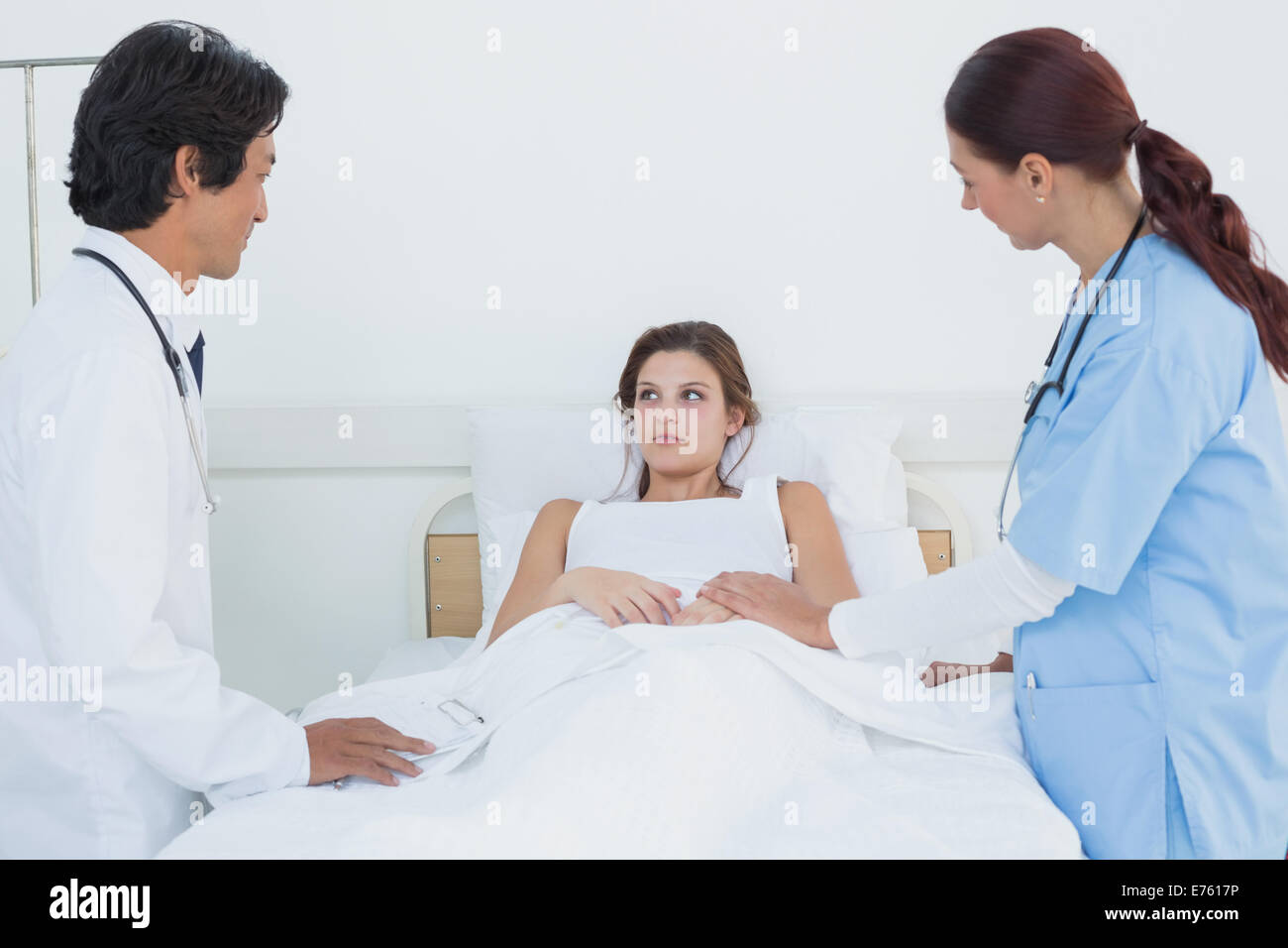 Doctor looking after his patient Stock Photo - Alamy