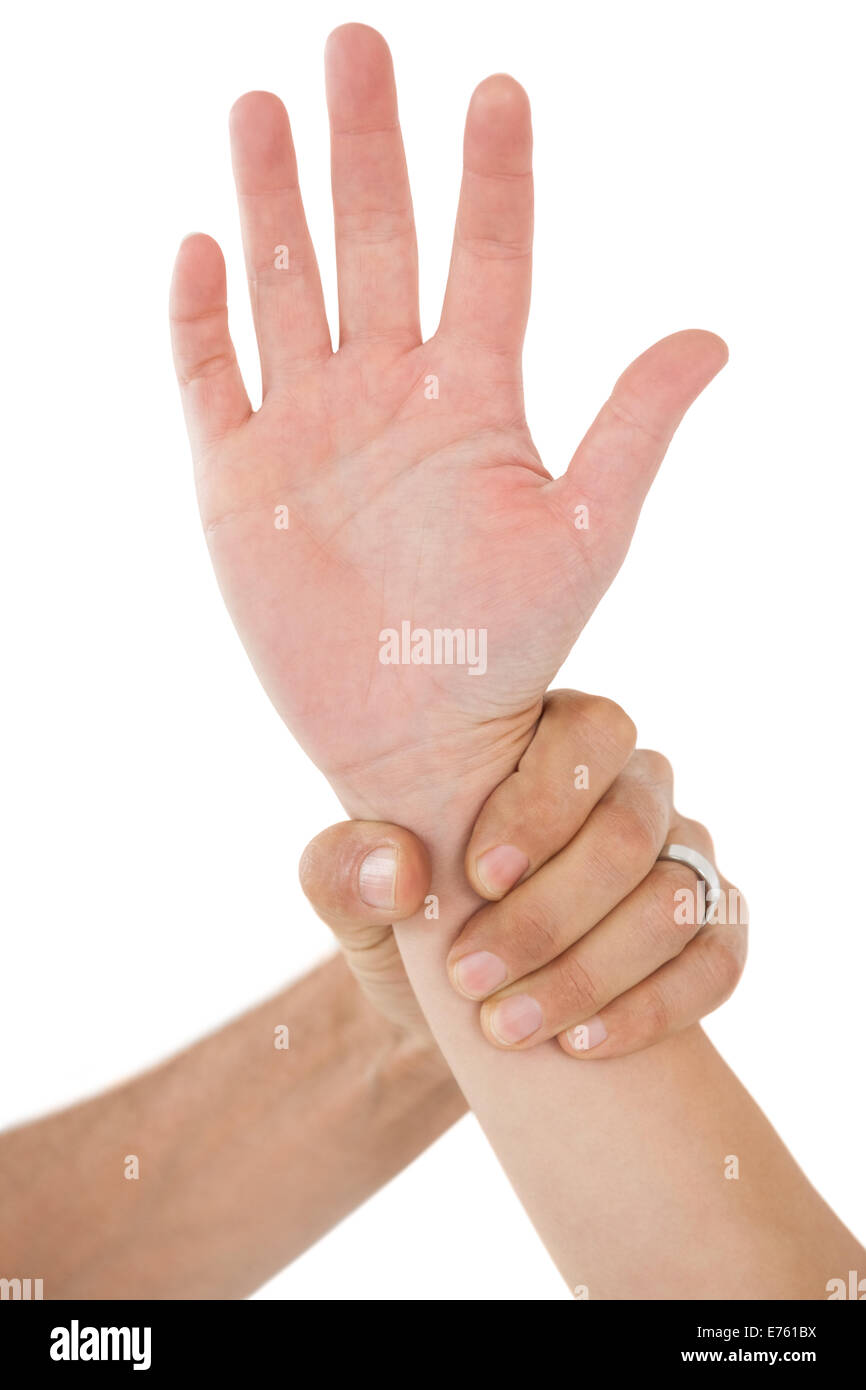 Team hand in hand help hi-res stock photography and images - Alamy