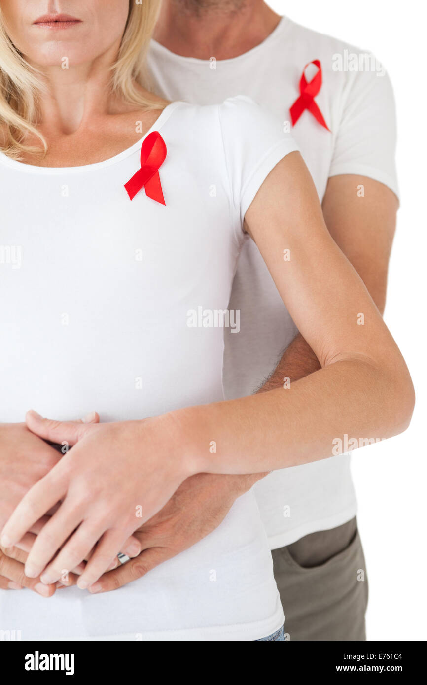 Couple supporting aids awareness together Stock Photo - Alamy