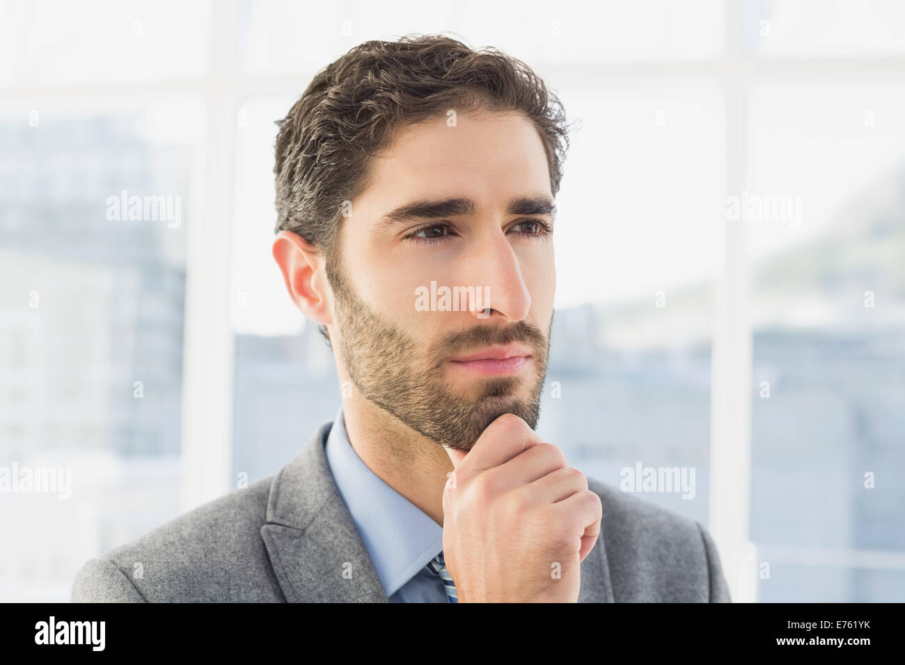 Businessman thinking about his work Stock Photo - Alamy