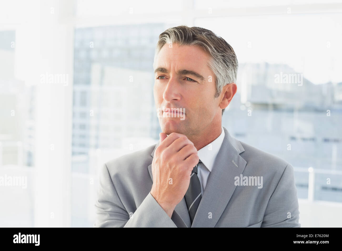 Businessman thinking about work Stock Photo - Alamy
