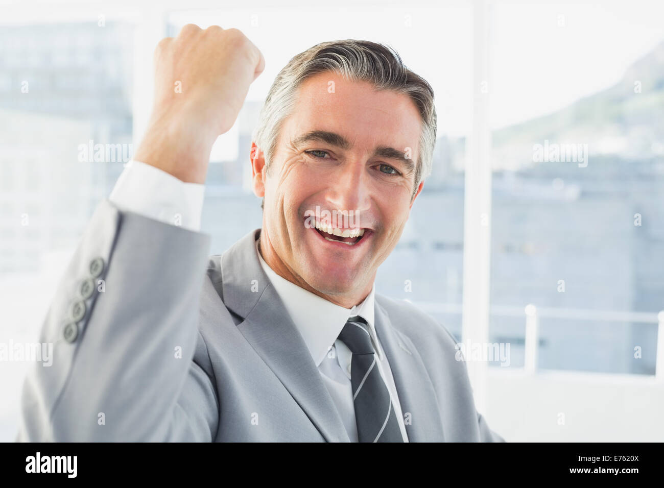 Mature boss businessman celebrating hi-res stock photography and images ...