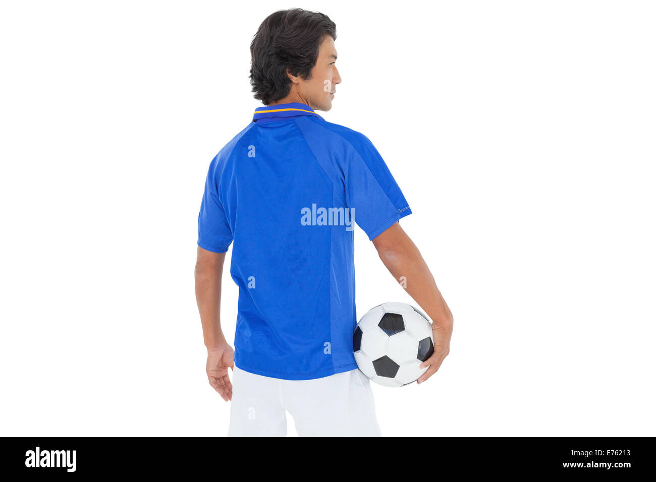 Rear view of a serious football player Stock Photo - Alamy