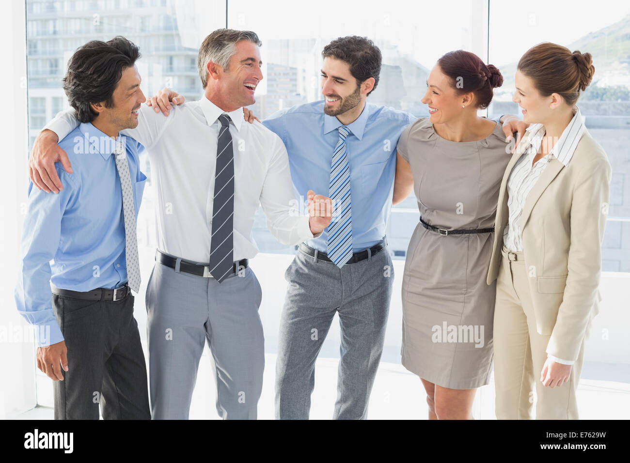 Employee's smiling and having fun Stock Photo - Alamy