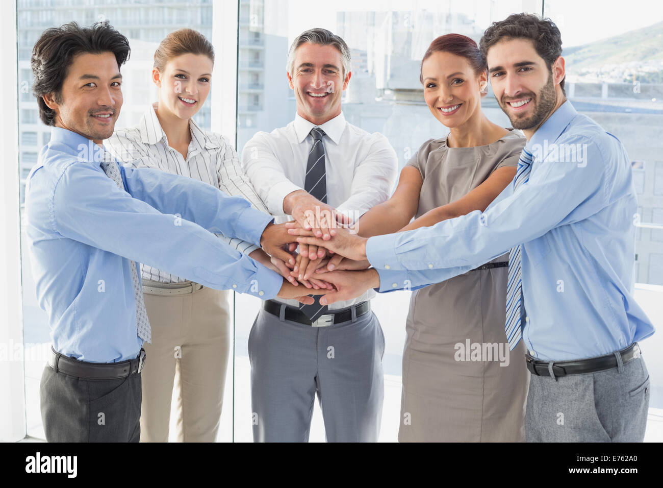 Employee's smiling and having fun Stock Photo - Alamy