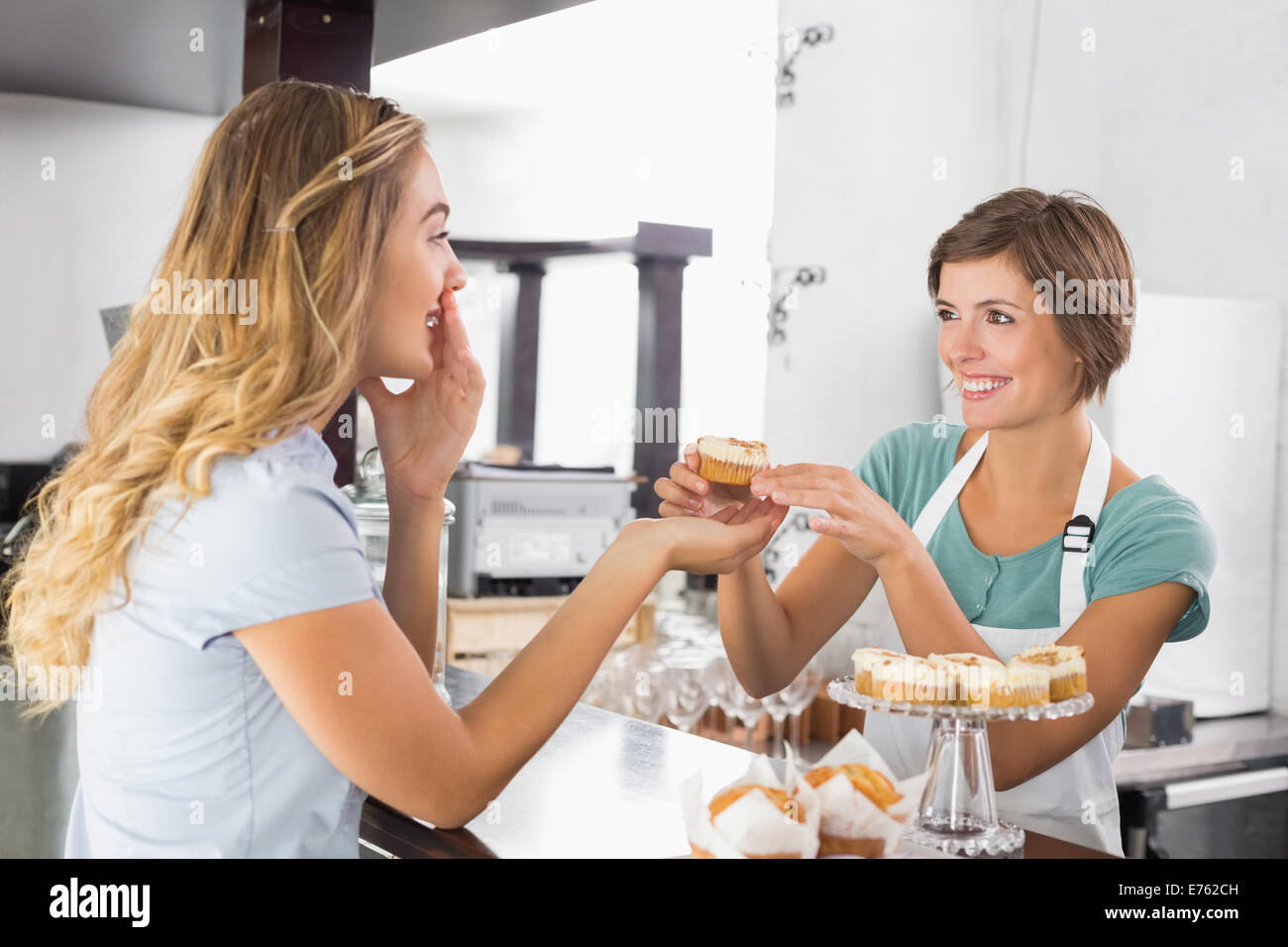 Pretty young female waitress serving hi-res stock photography and images - Alamy