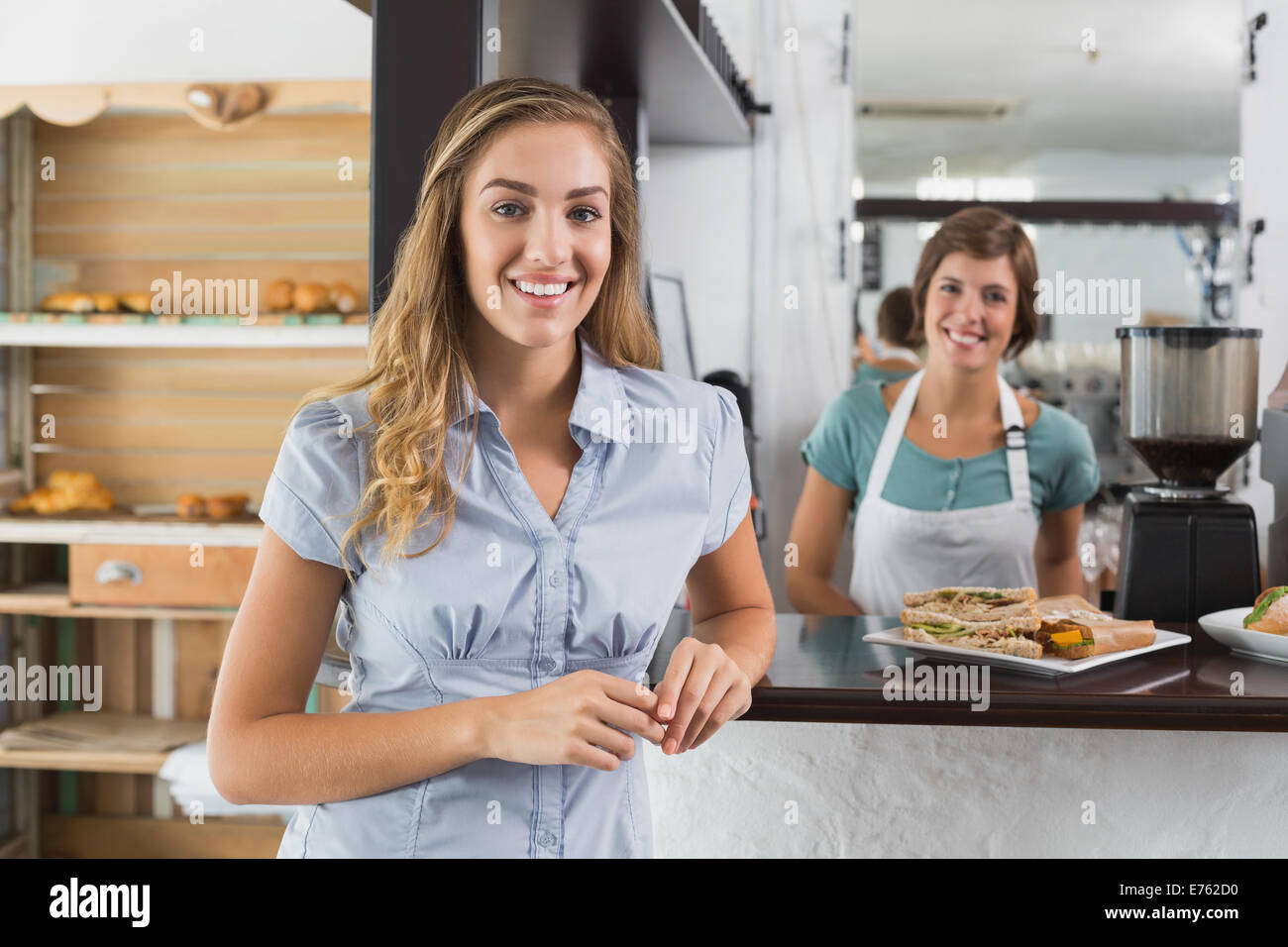 Customer smiling hi-res stock photography and images - Alamy