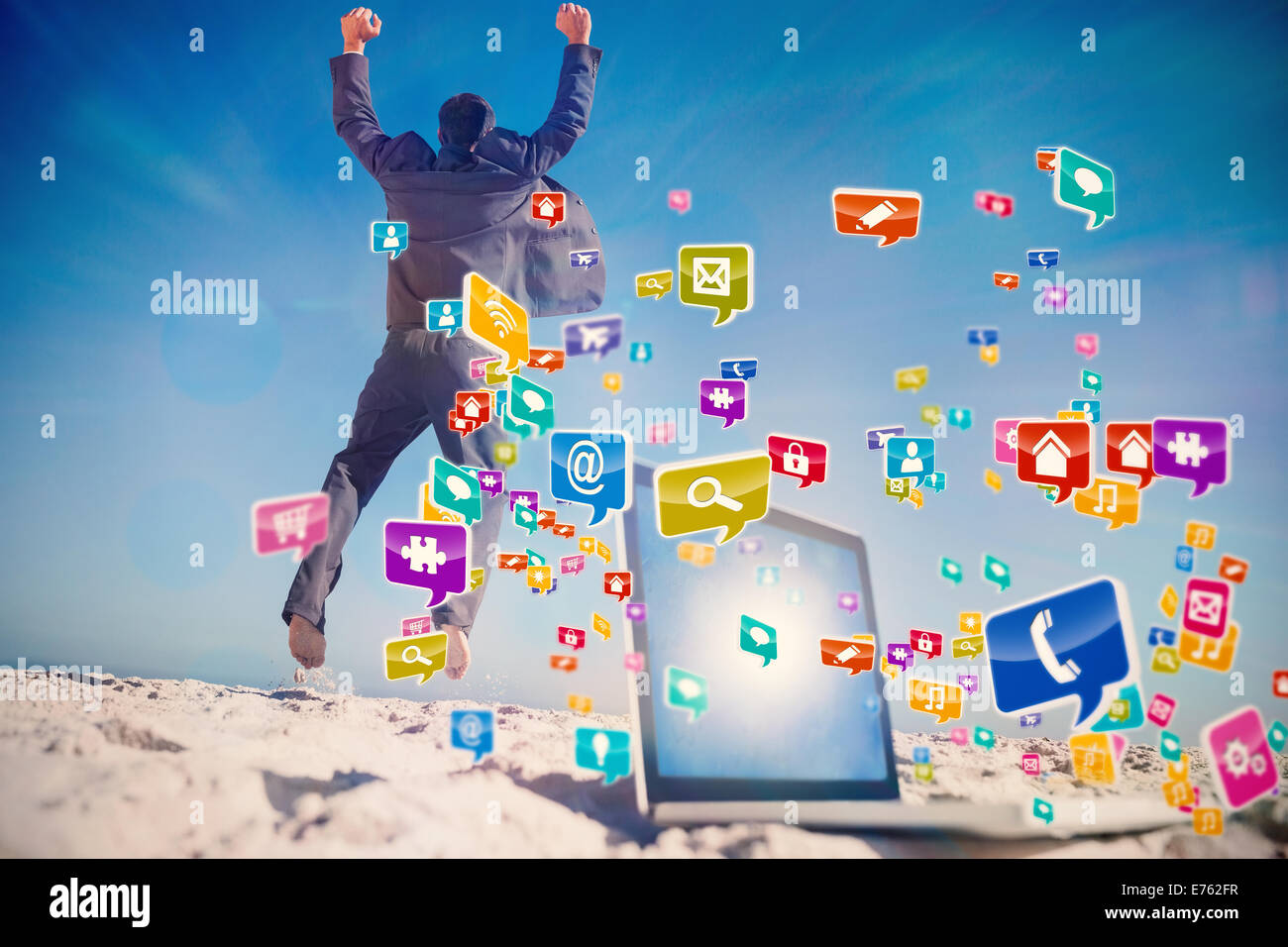 Man suit jumping laptop hi-res stock photography and images - Alamy