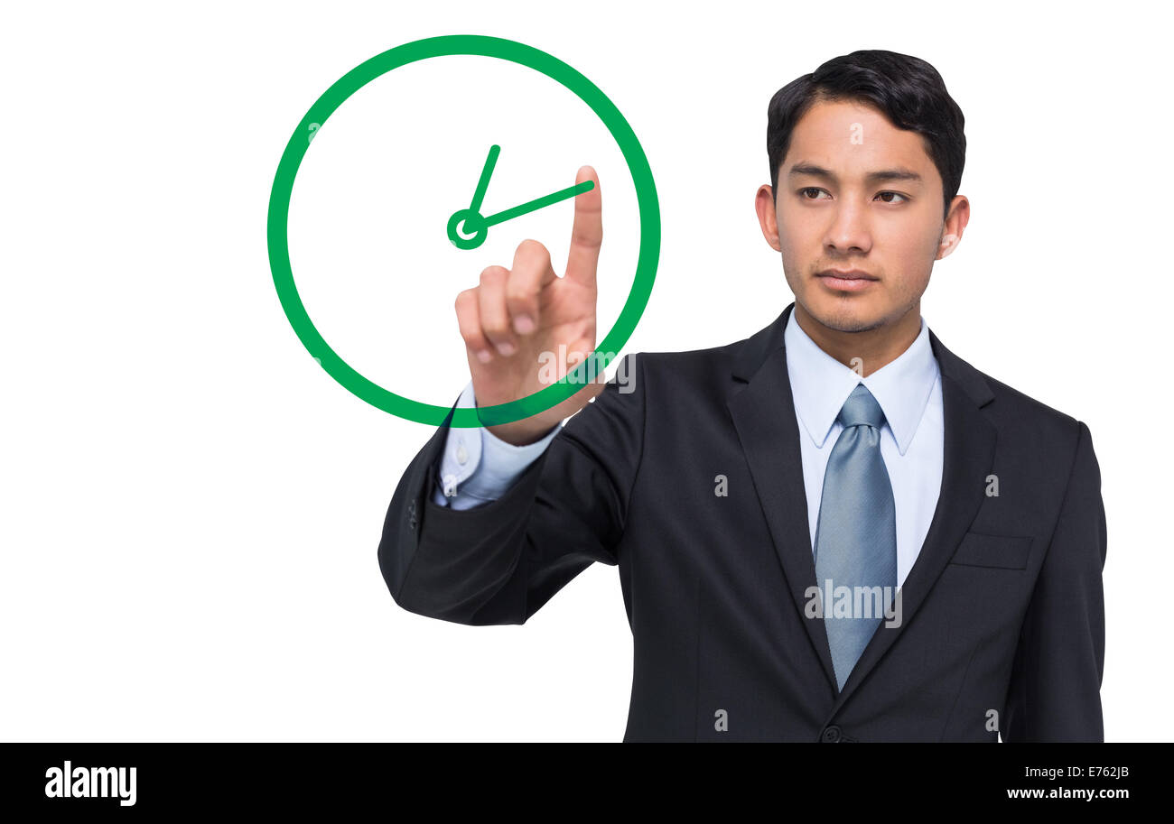 Composite image of stern asian businessman pointing Stock Photo - Alamy