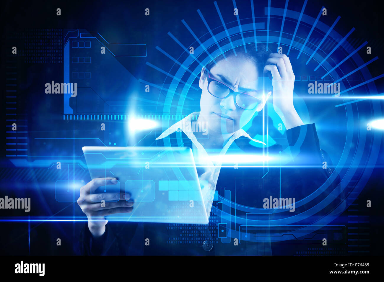 Composite image of thinking businesswoman looking at tablet pc Stock ...