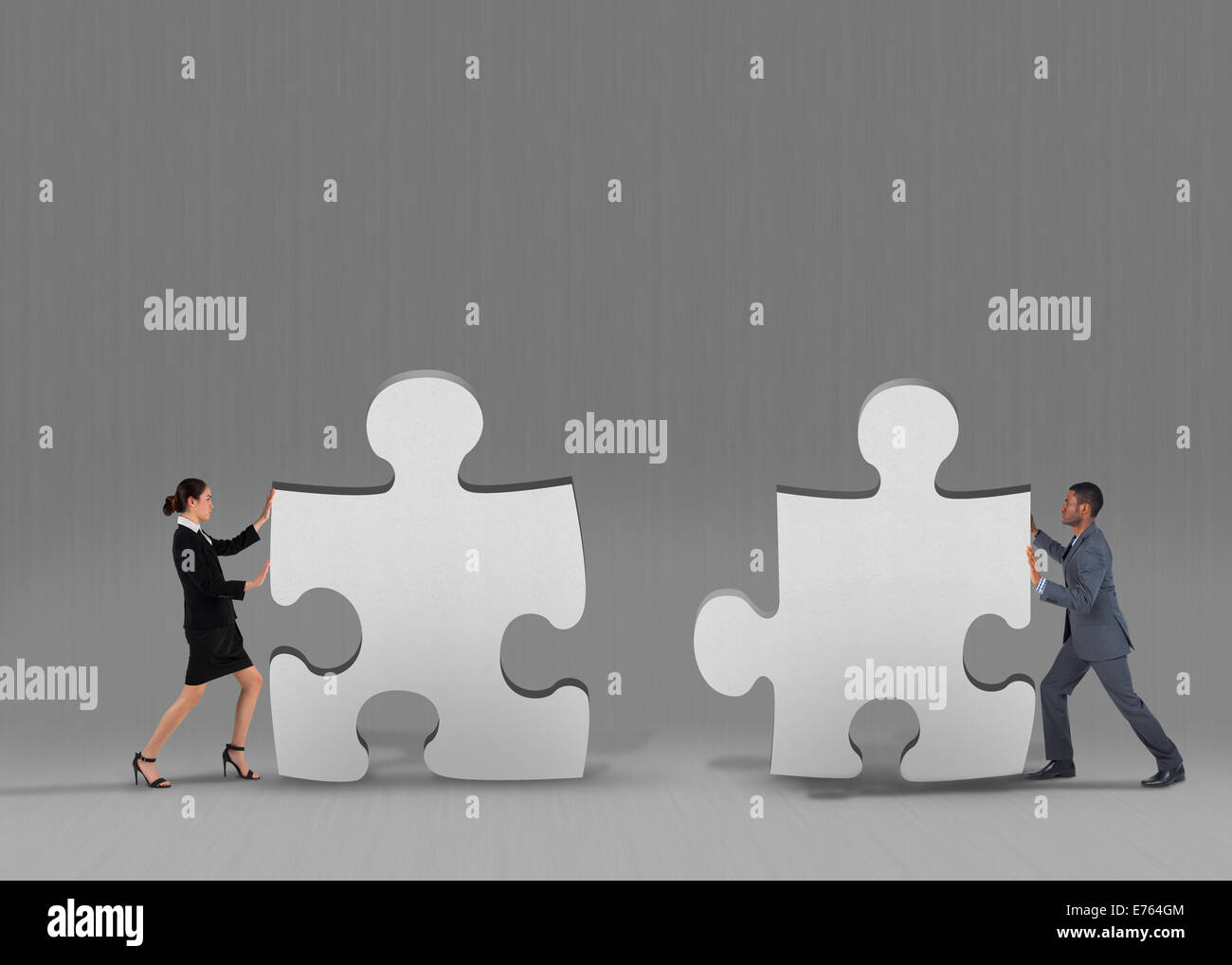 Composite image of business team standing and pushing Stock Photo - Alamy