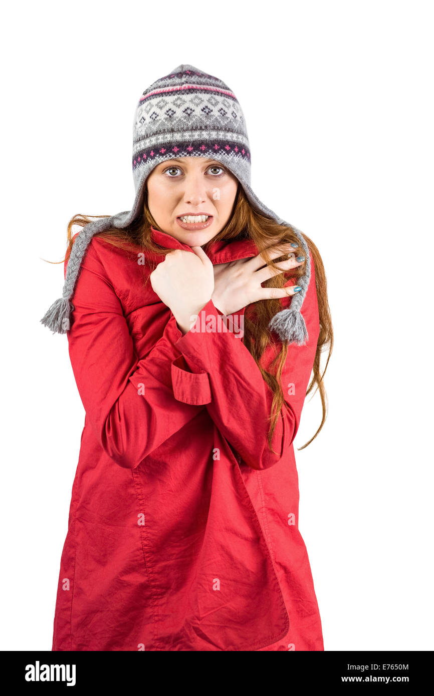 Cold redhead wearing coat and hat Stock Photo - Alamy