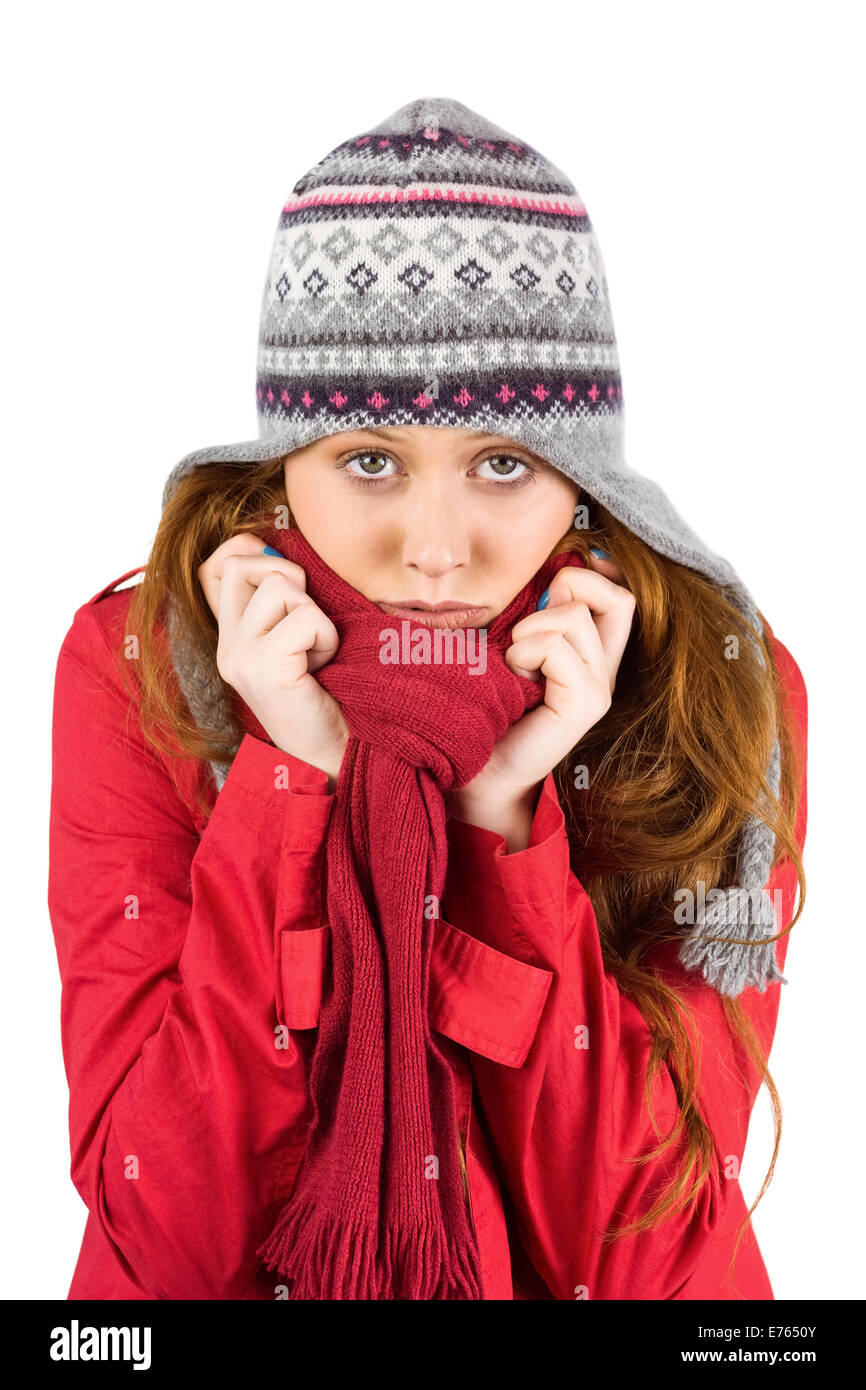 Cold redhead wearing coat and hat Stock Photo - Alamy