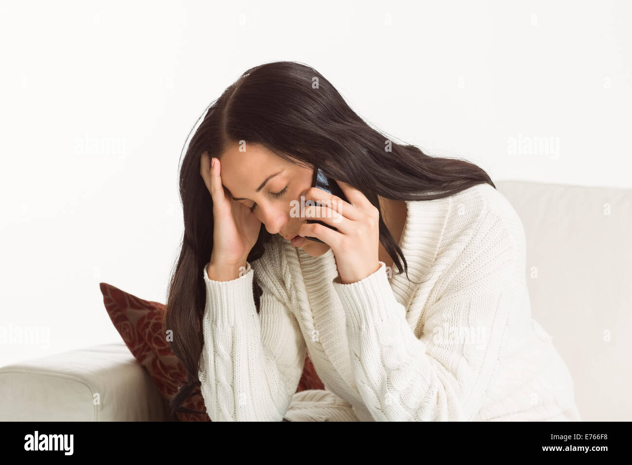 Woman having a bad phonecall Stock Photo - Alamy