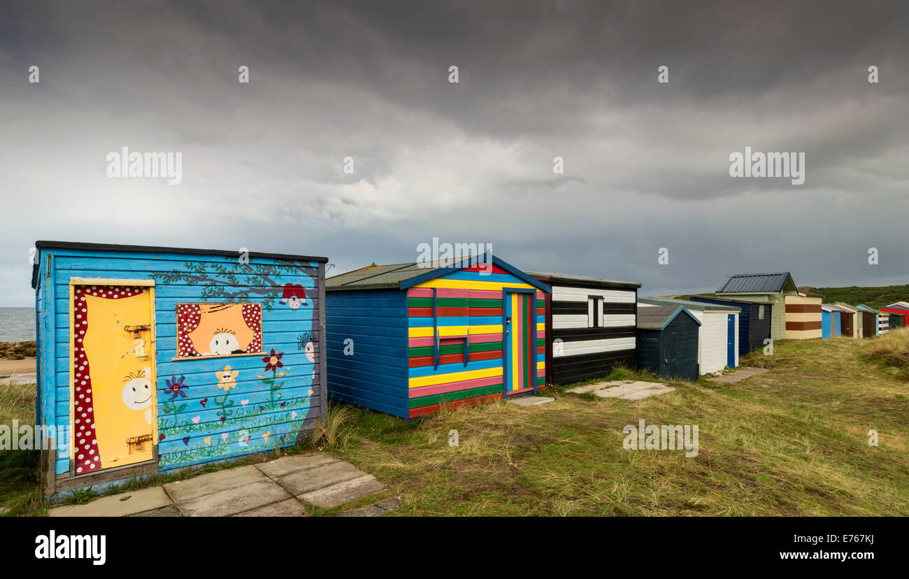 CHALETS AT HOPEMAN BEACH MORAY RAIN CLOUDS PASSING OVER A LINE OF ...