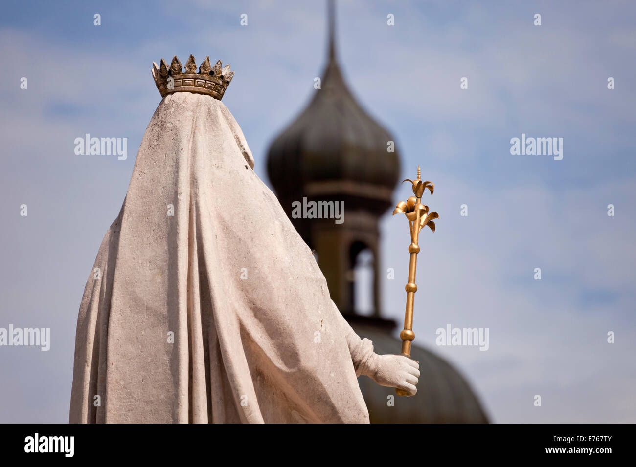 statue of Maria and the Town Hall tower on Kapellplatz square in ...