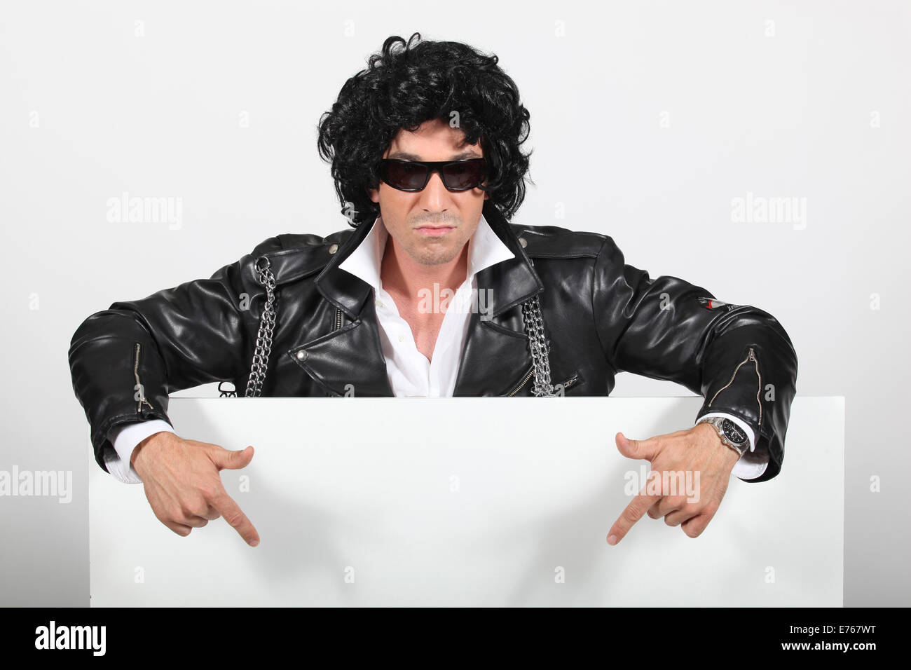 portrait of a man in rocker costume Stock Photo - Alamy