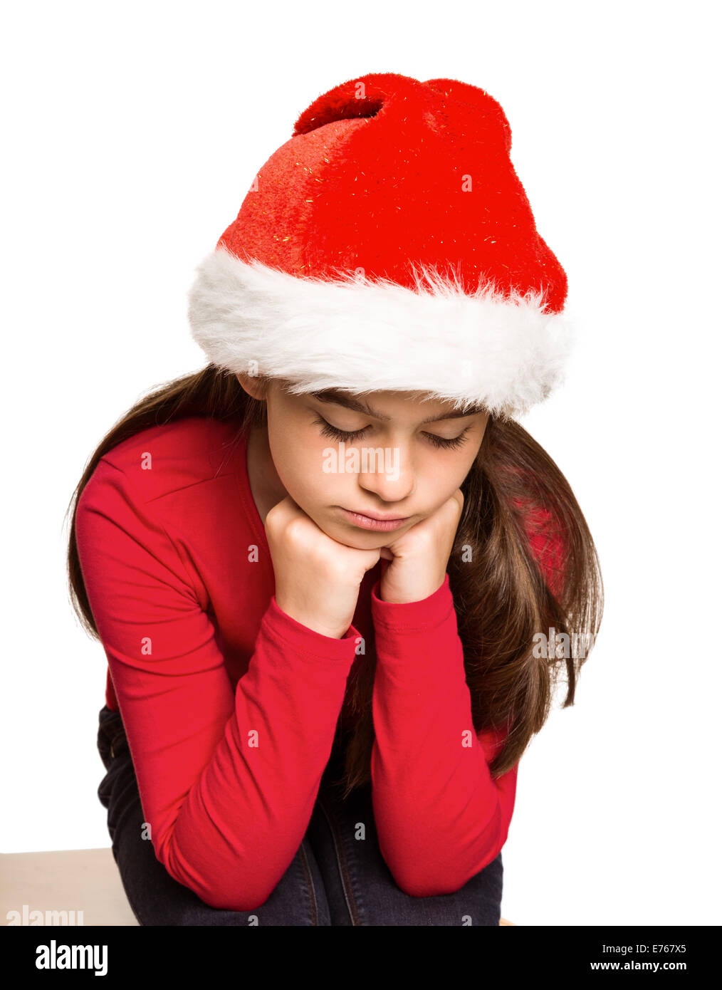 Festive little girl feeling sad Stock Photo - Alamy