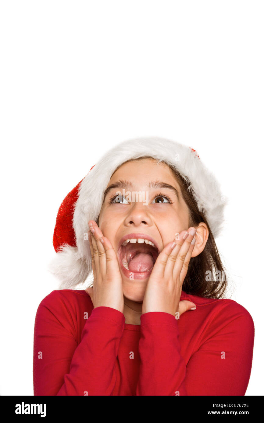 Festive little girl looking surprised Stock Photo - Alamy