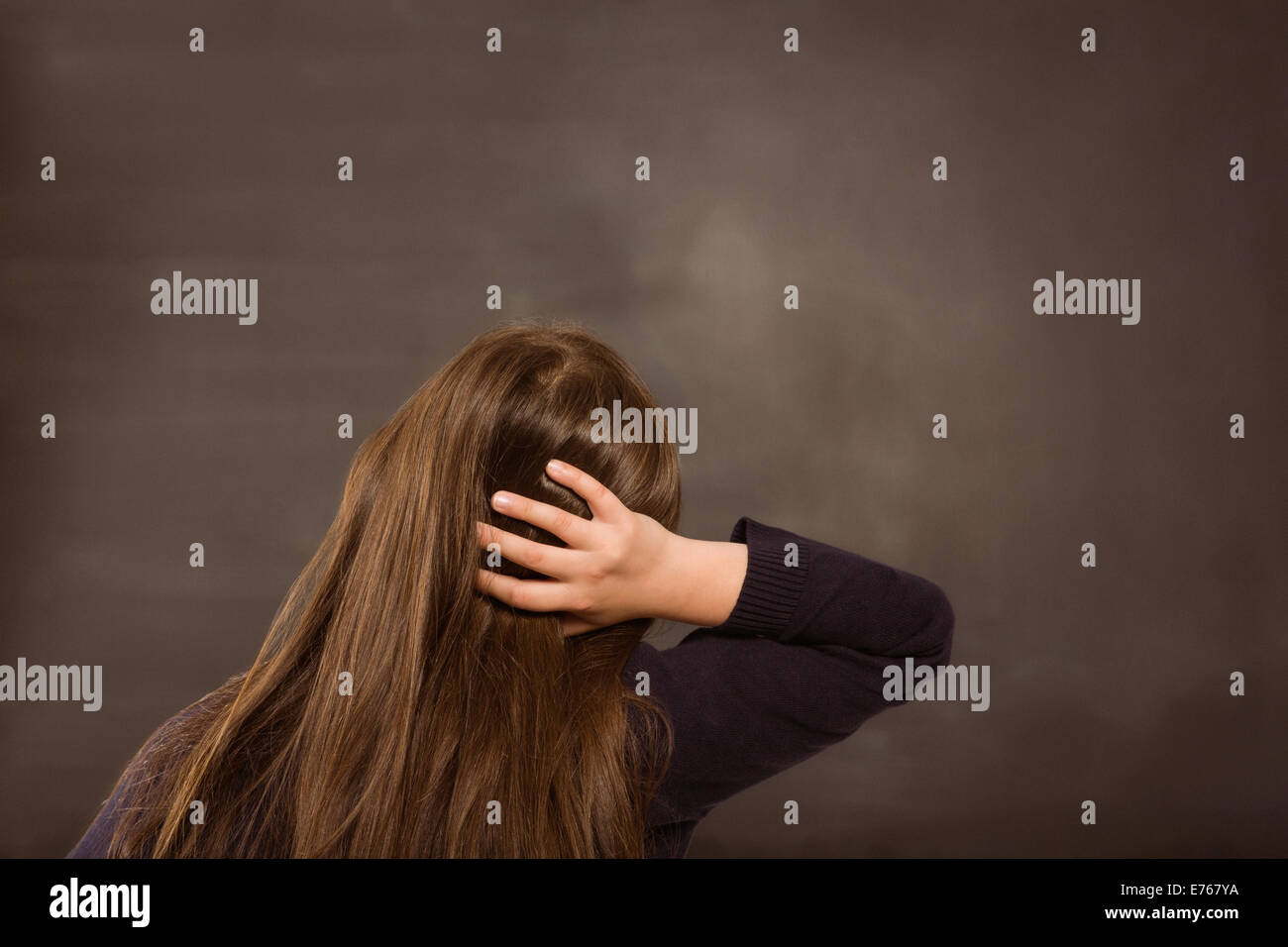 Confused girl blackboard hi-res stock photography and images - Alamy