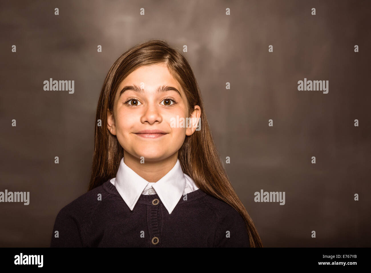 Cute pupil smiling at camera Stock Photo - Alamy