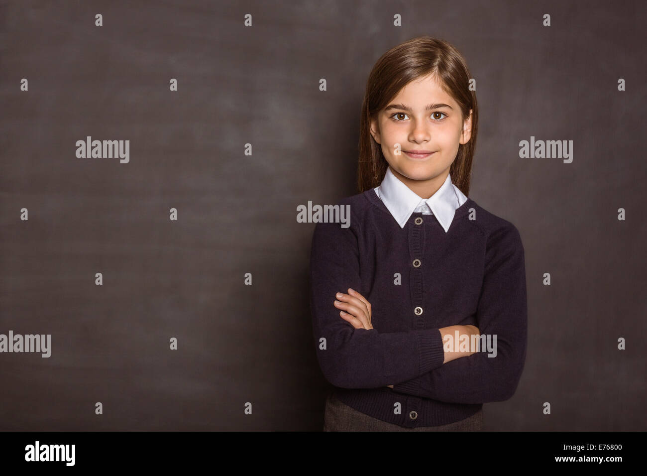 Cute pupil smiling at camera Stock Photo - Alamy