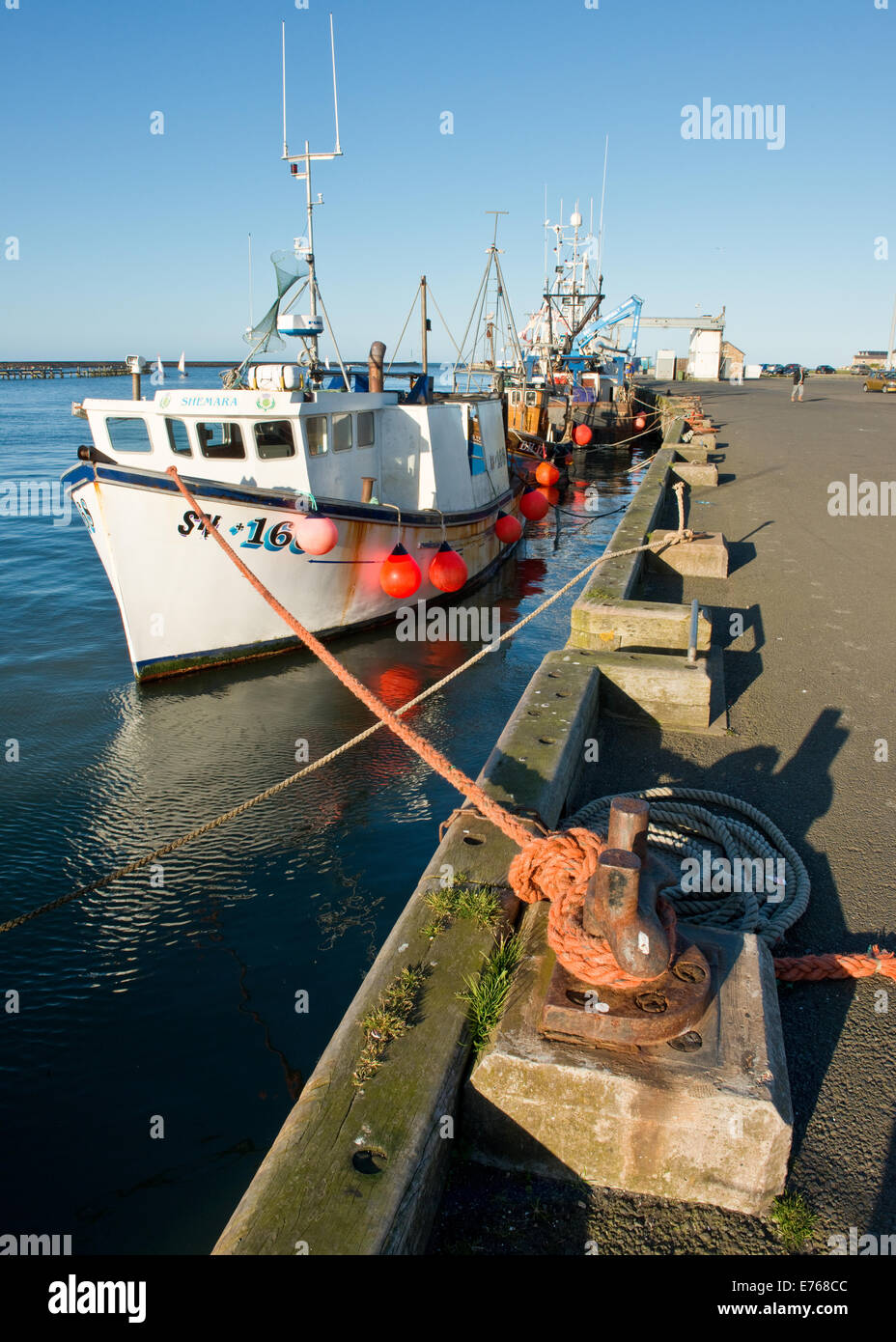 North Sea fishing trawlers moored in Amble, Northumberland, England, UK ...