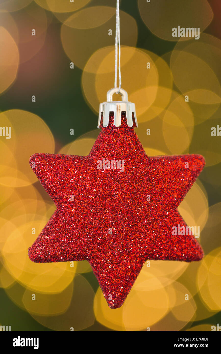 Red christmas star decoration hanging Stock Photo - Alamy