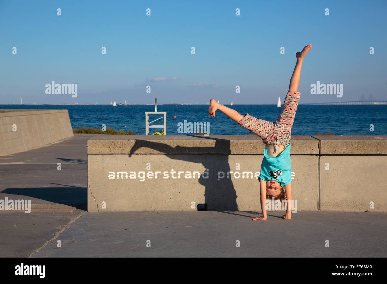 Girl Turning Cartwheel High Resolution Stock Photography and Images - Alamy