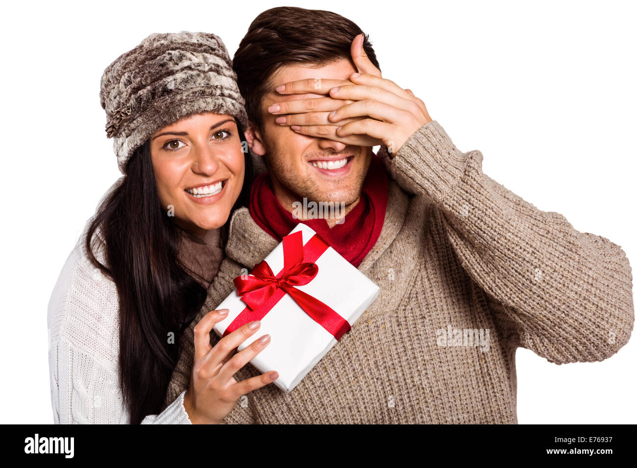 Young woman giving gift to boyfriend Stock Photo - Alamy