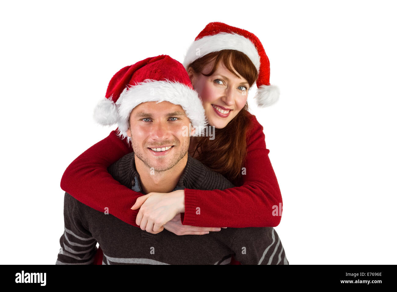 Man giving woman piggy back Stock Photo - Alamy