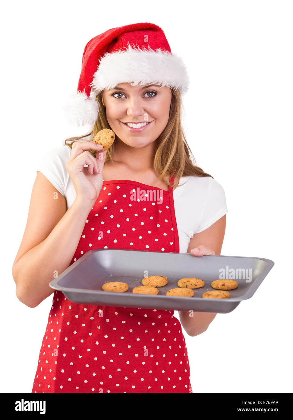 Festive homemaker showing hot cookies Stock Photo - Alamy