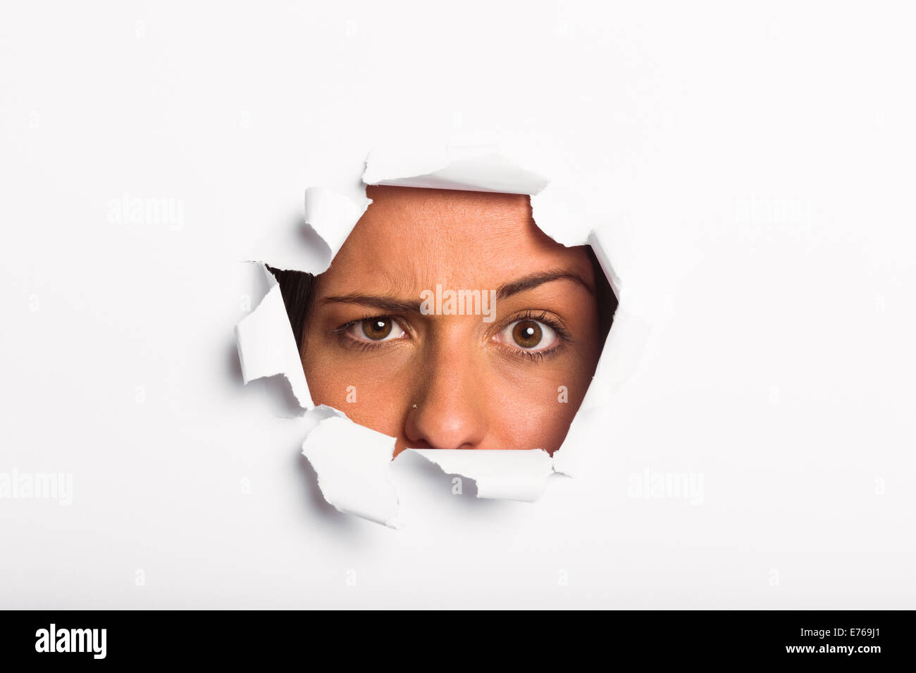 Woman rip paper hi-res stock photography and images - Alamy