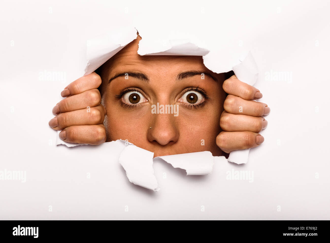 Surprised female looking paper hi-res stock photography and images - Alamy