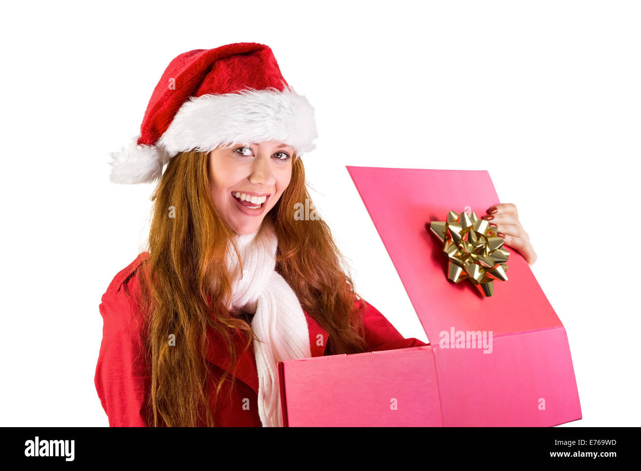 Woman smiling opening gift Cut Out Stock Images & Pictures - Alamy