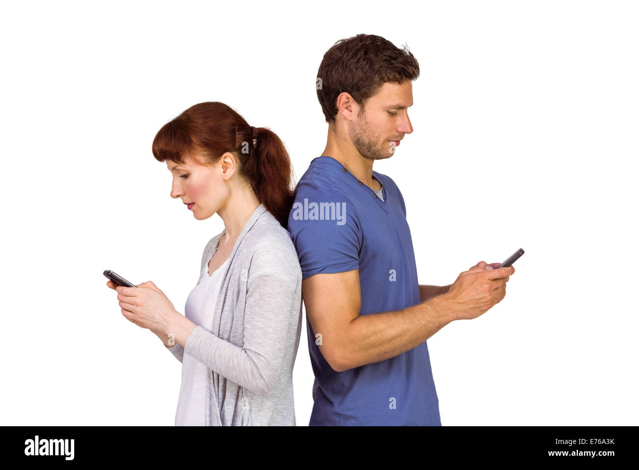 Cute couple sending text message hi-res stock photography and images ...