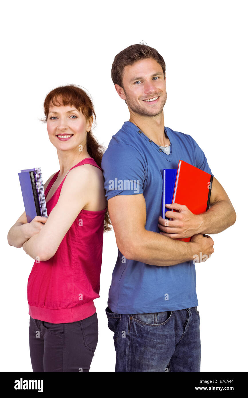 Two students both with notepads Stock Photo - Alamy